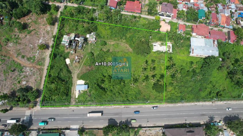 Prime 1-Hectare Lot For Sale on National Road in Compostela